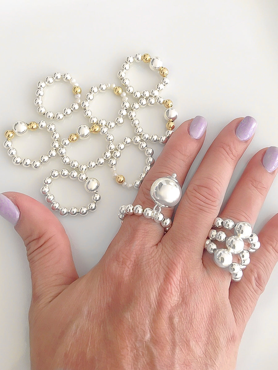 Silver and two tones ball elastic rings each – LIZET MIRO DESIGN